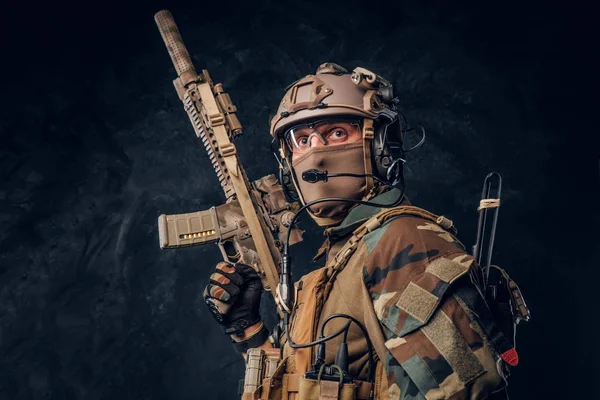 Elite unit, special forces soldier in camouflage uniform posing with ...