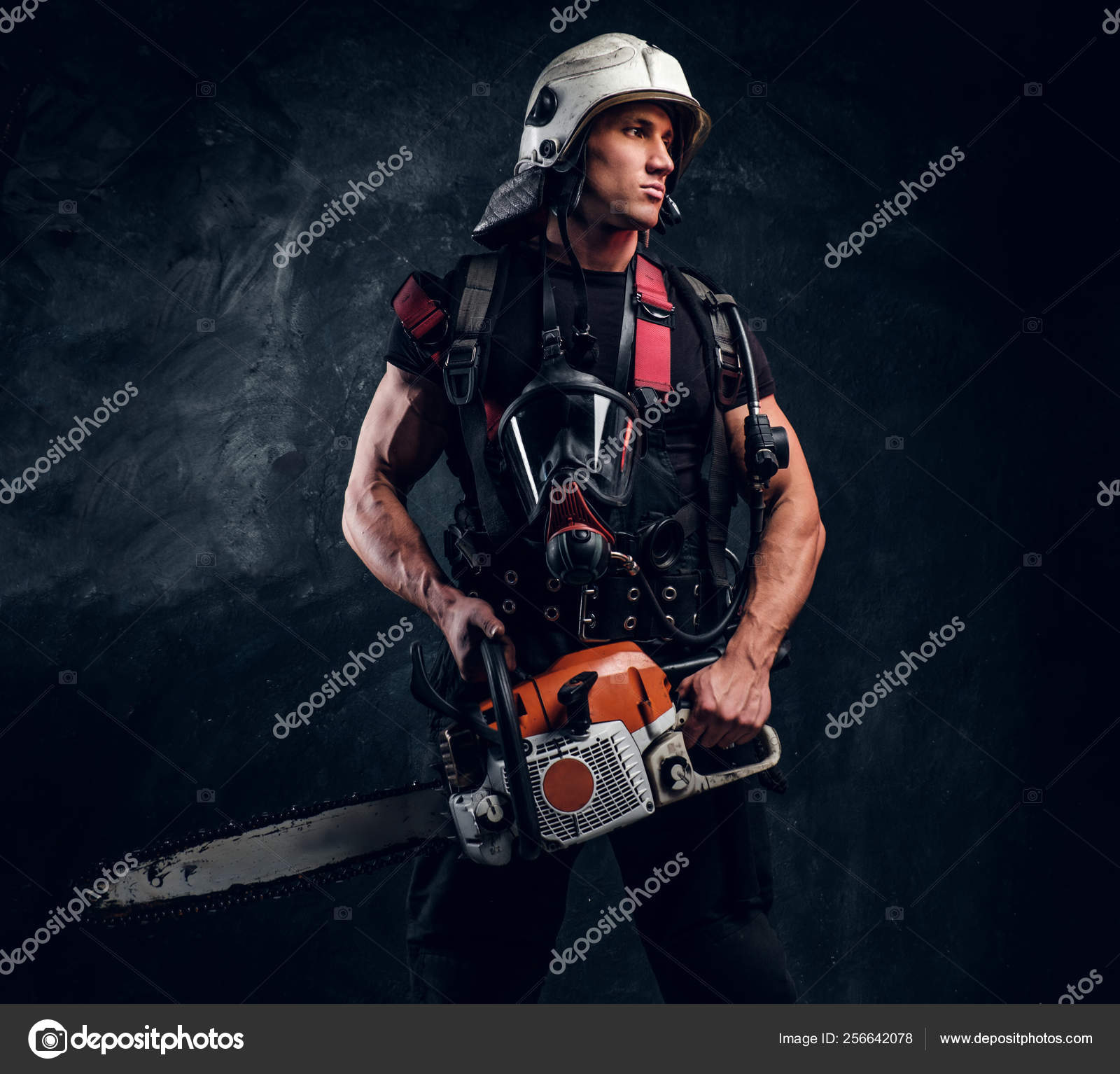 Portrait of strong man with chainsaw and oxygen mask — Stock Photo ...