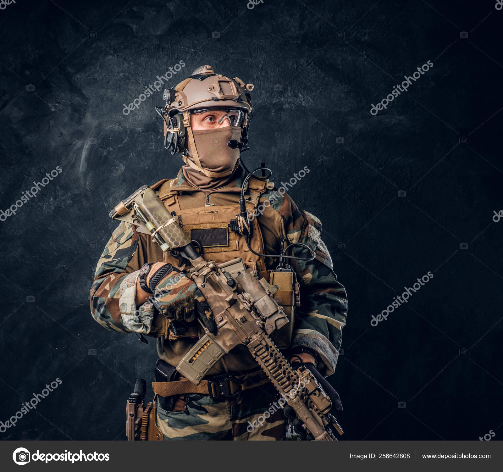 Elite unit, special forces soldier in camouflage uniform posing with ...