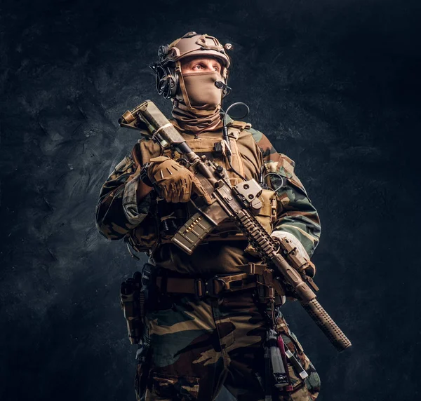 Elite unit, special forces soldier in camouflage uniform posing with ...