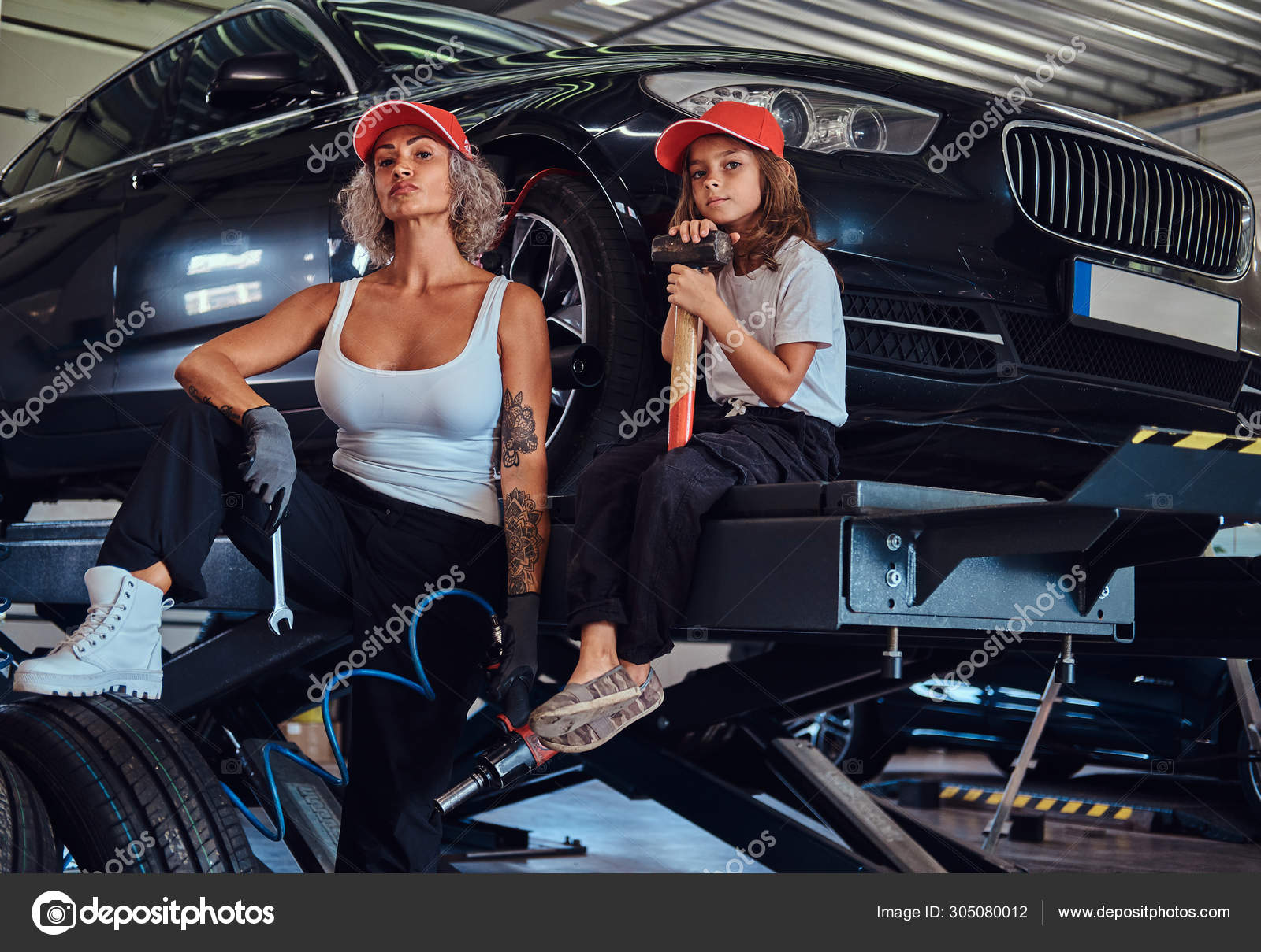 Perfect dream team at auto service — Stock Photo © fxquadro #305080012