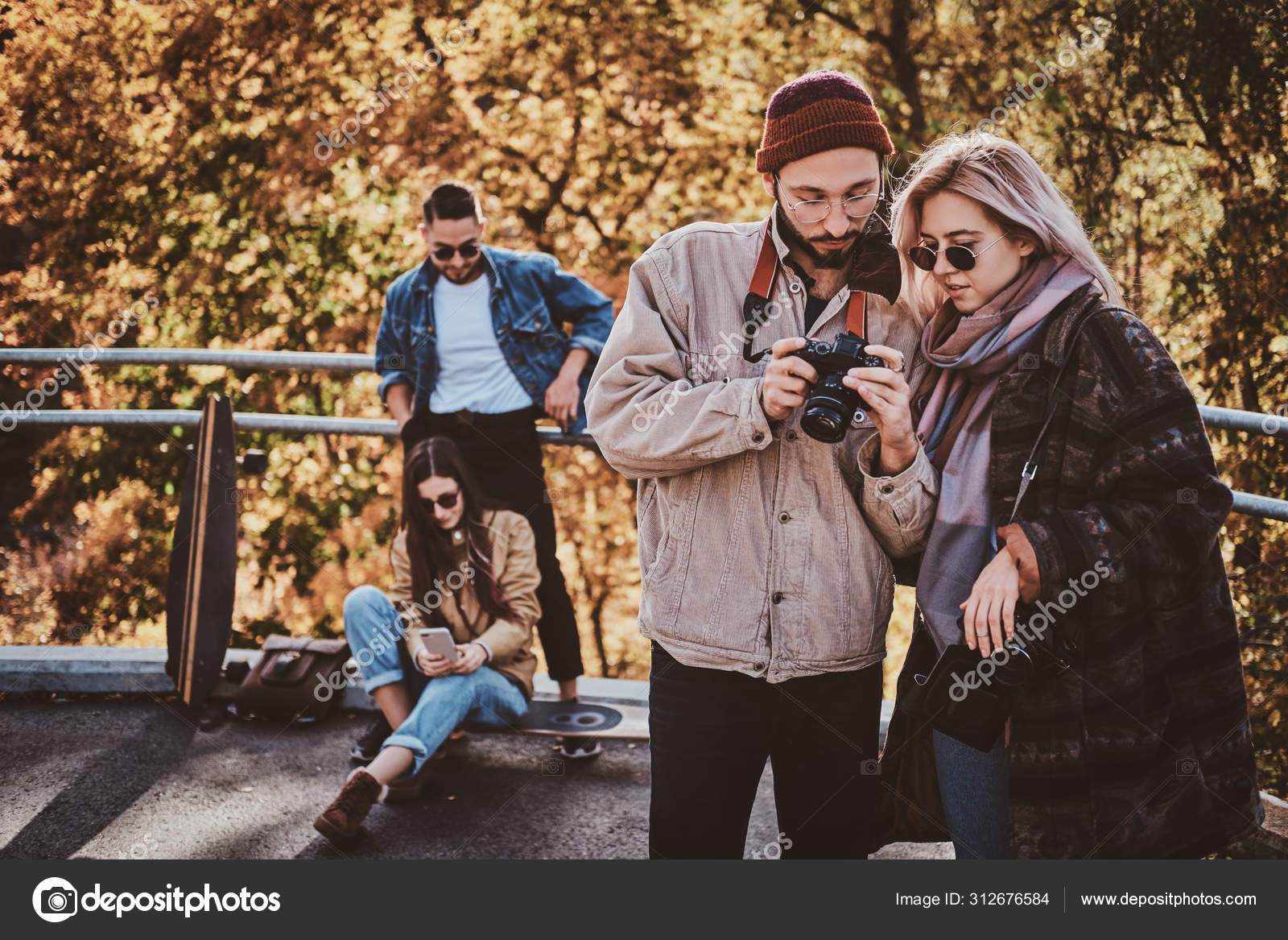 People are watching photos on photo camera — Stock Photo © fxquadro ...