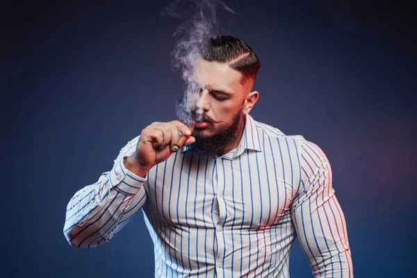 Elegance bodybuilder in white shirt smoking cigar Stock Photo by ...
