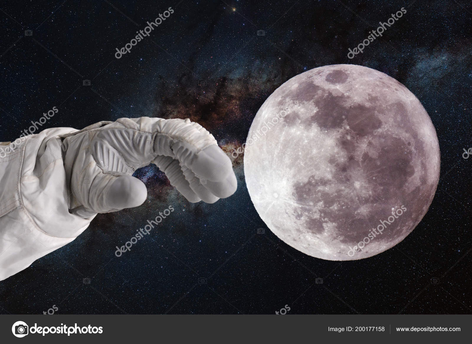 Development of moon, concept. Hand of astronaut astronaut pulls his ...