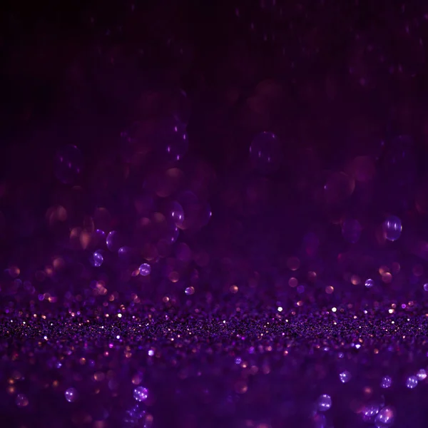 Purple glitter magic background. Defocused light and free focused place ...
