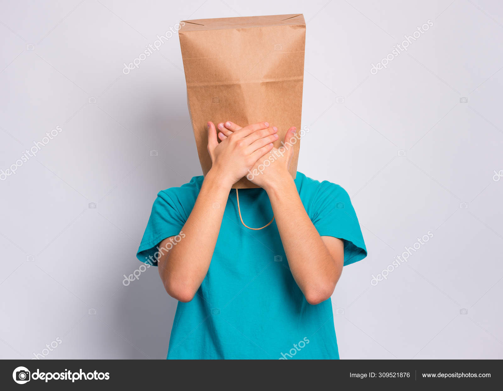 Boy with paper bag over head — Stock Photo © DenisNata #309521876
