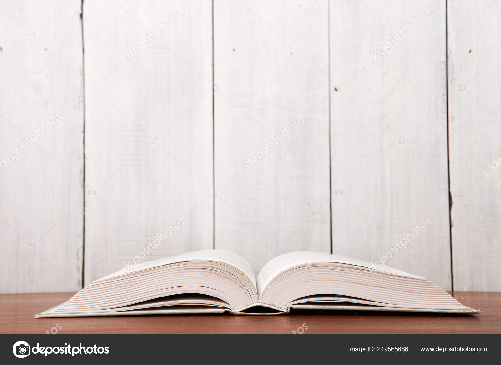 Open Book Desk Wooden Background Stock Photo by ©sensay 219565686