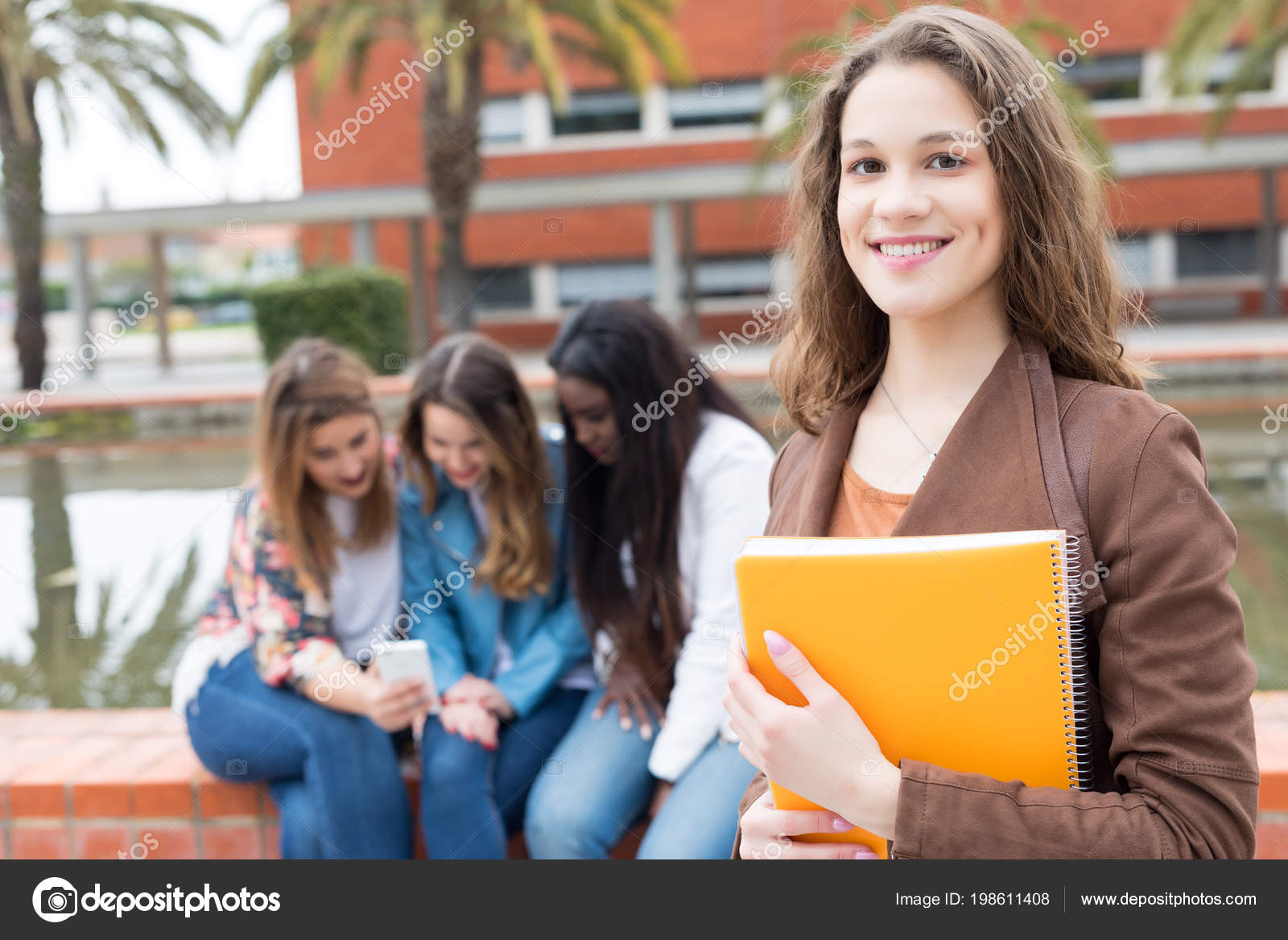 Smiling Student Posing Books University Campus Stock Photo by ©hsfelix ...