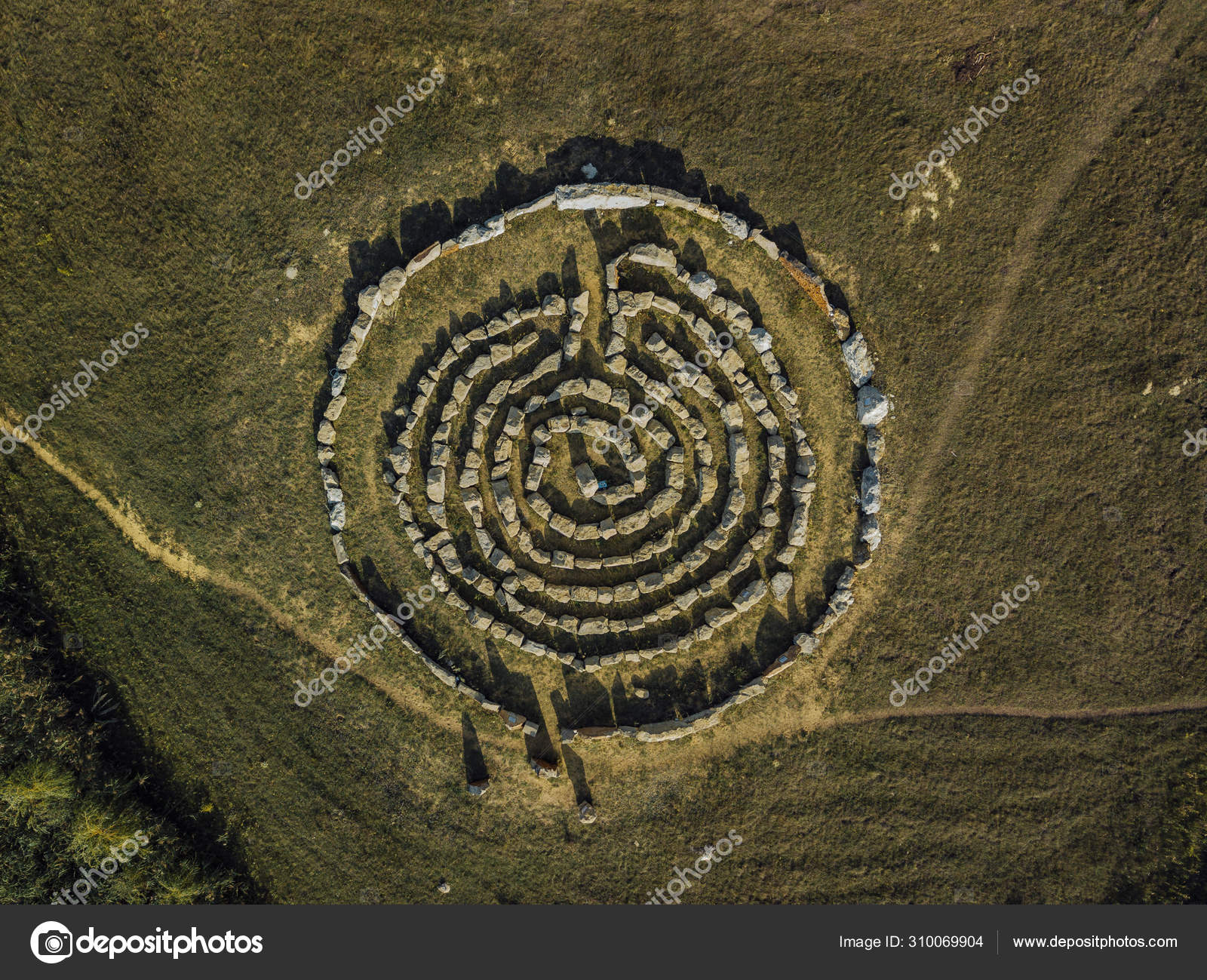 Spiral labyrinth made of stones, top view from drone Stock Photo by ...