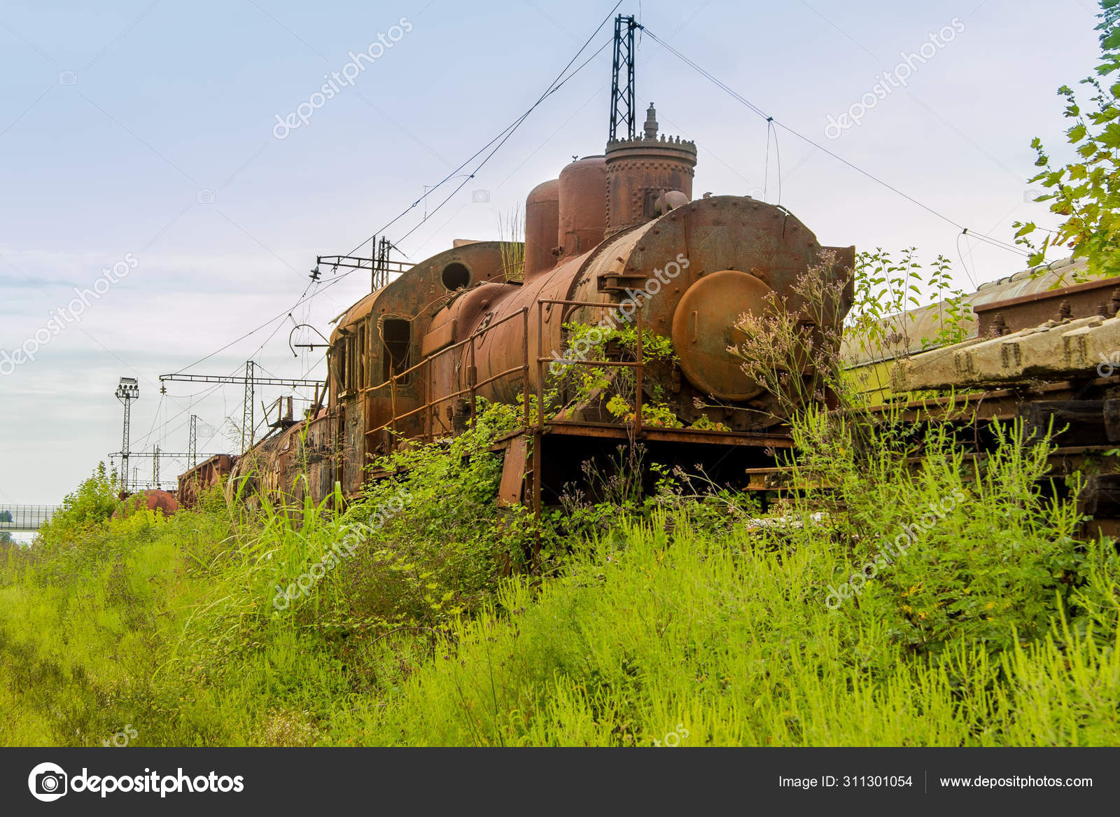 Abandoned train. Abandoned railway. Old rusty steam locomotive o ...