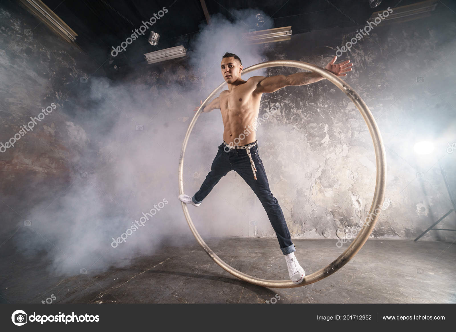 Strong Circus Performer Spinning Cyr Wheel — Stock Photo © butoc_89 ...