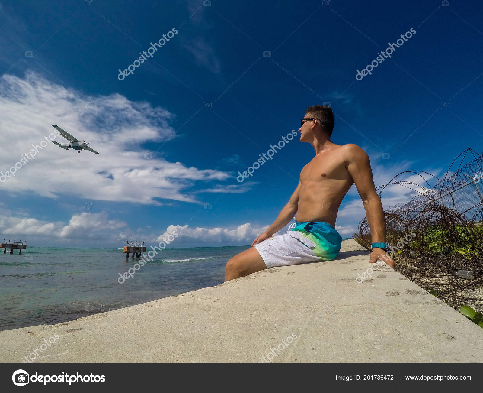 Muscular Man Coast Watching Landing Airplane Flying Sea Caribbean Sea ...