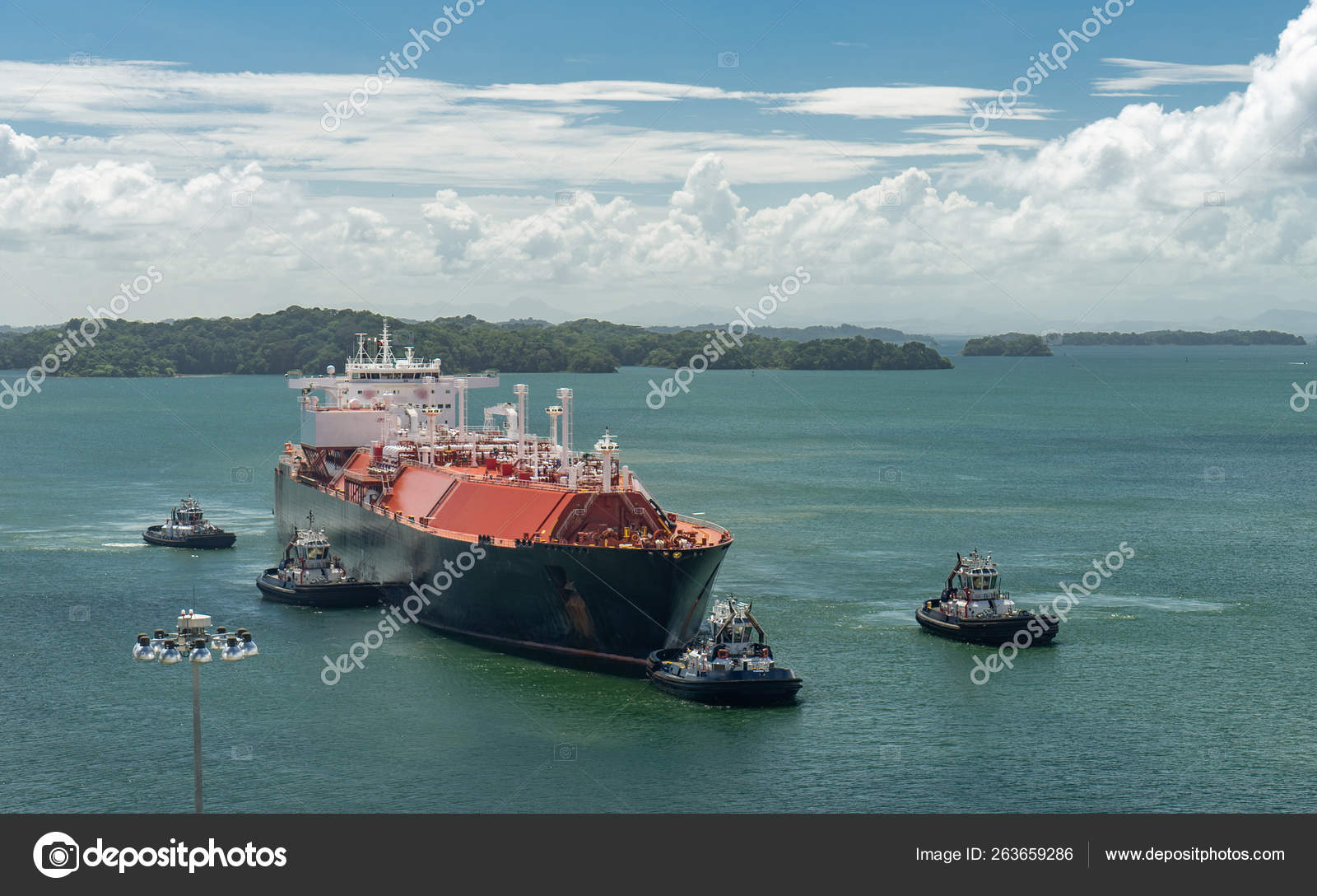 Large transport ship moving across Gatun Lake in the Panama Canal ...