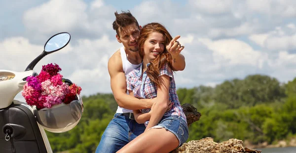 Shirtless man sitting on bike hugging female Stock Photos, Royalty Free Shirtless man sitting on ...