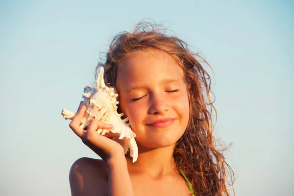 Child on the beach Stock Photo by ©TatyanaGl 44080861