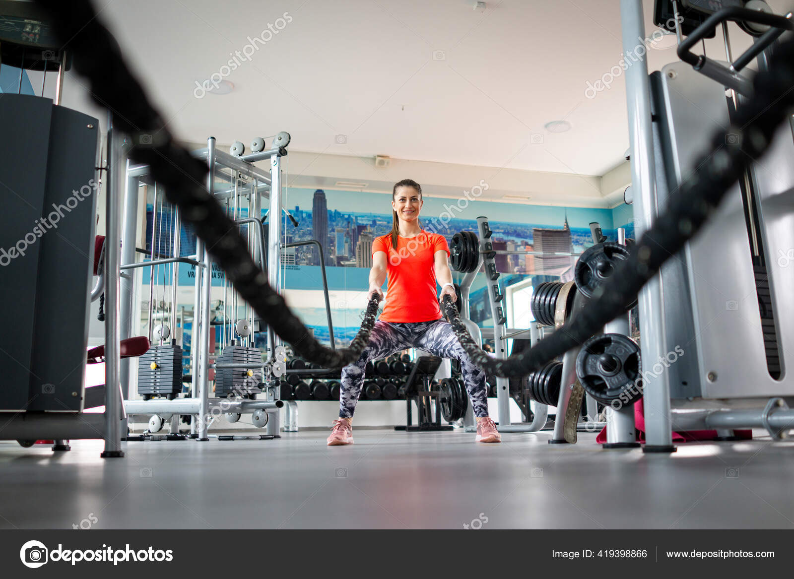 Pretty Young Woman Using Battling Ropes Gym — Stock Photo © zurijeta ...