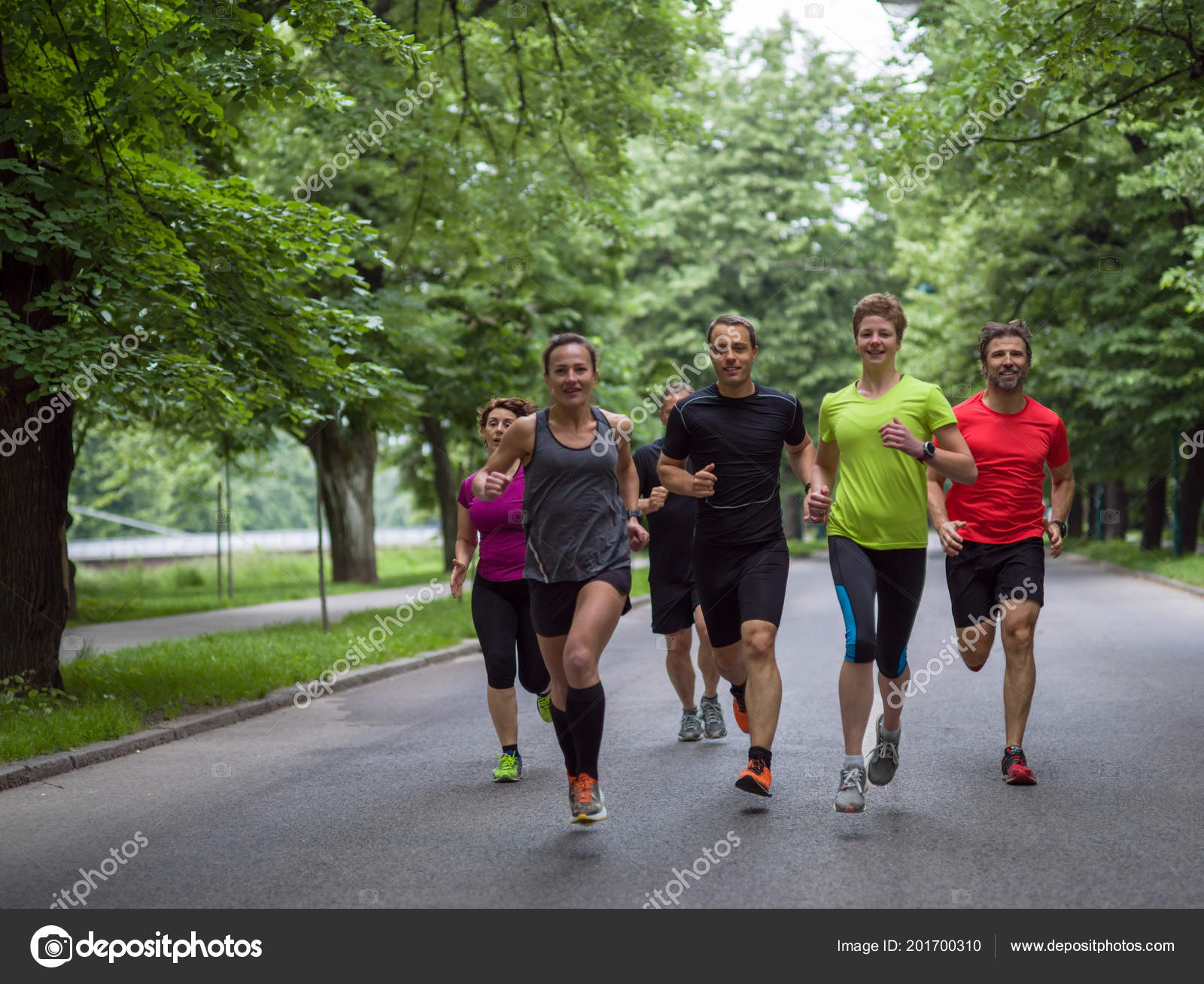 People Jogging In Park
