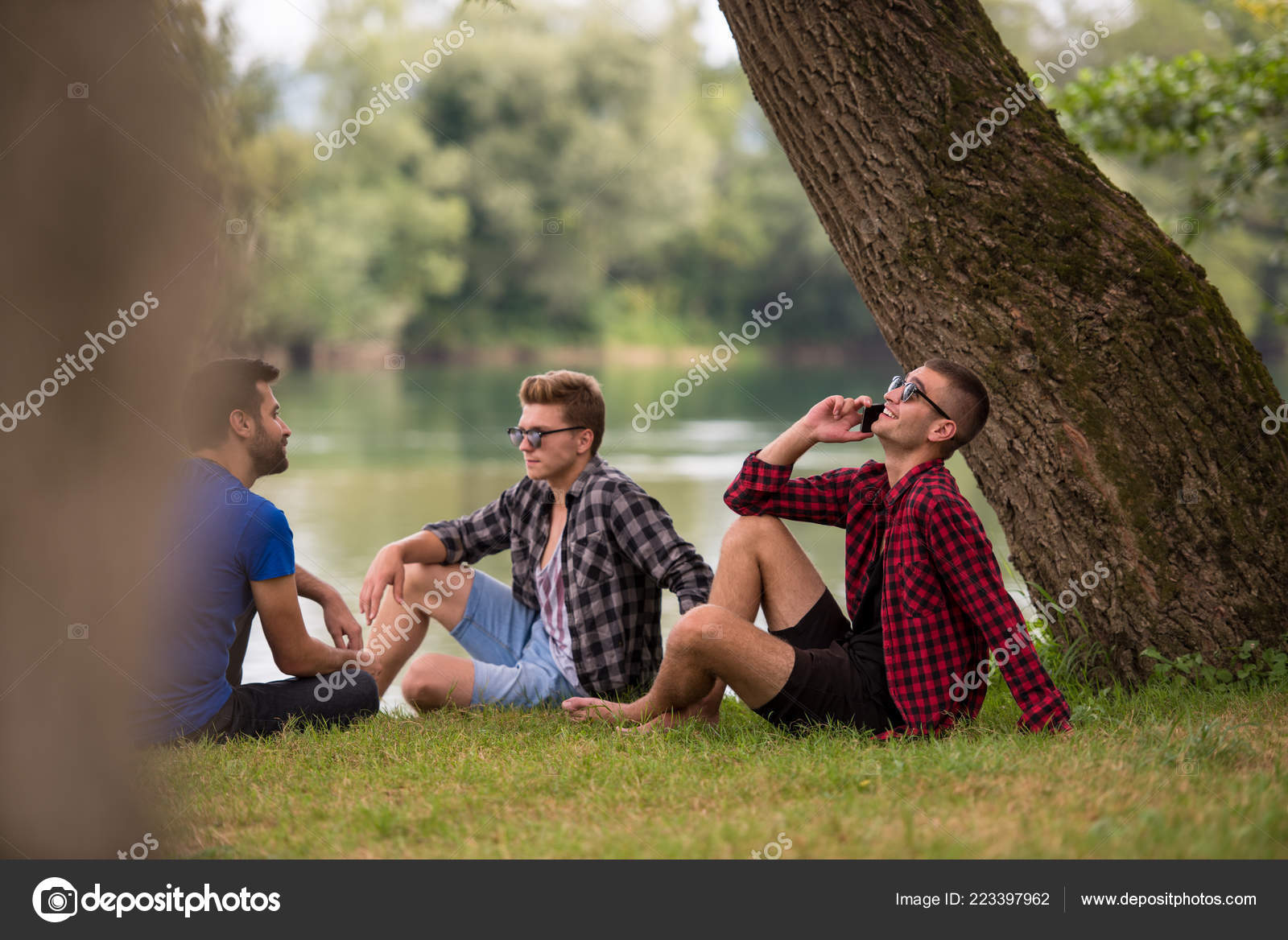 Group Young Men Enjoying Nature Sitting Bank River Stock Photo by ...