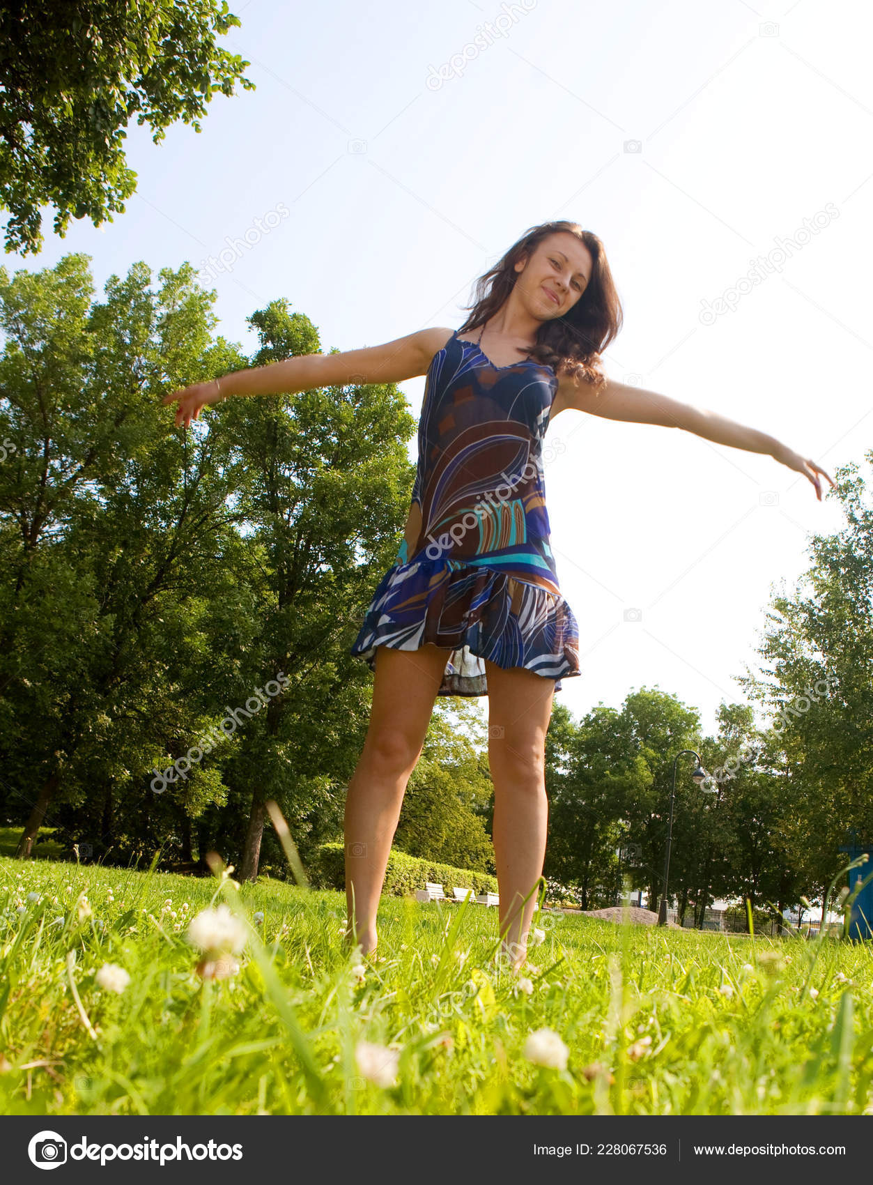 Beautiful model in the park Stock Photo by ©kanareva 228067536
