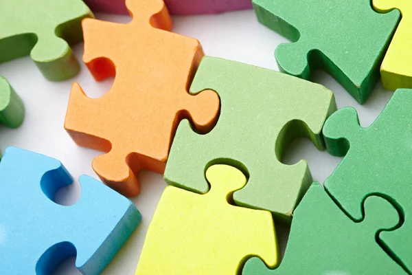 Bright Colorful Puzzle Pieces Close — Stock Photo © strelok #249889446