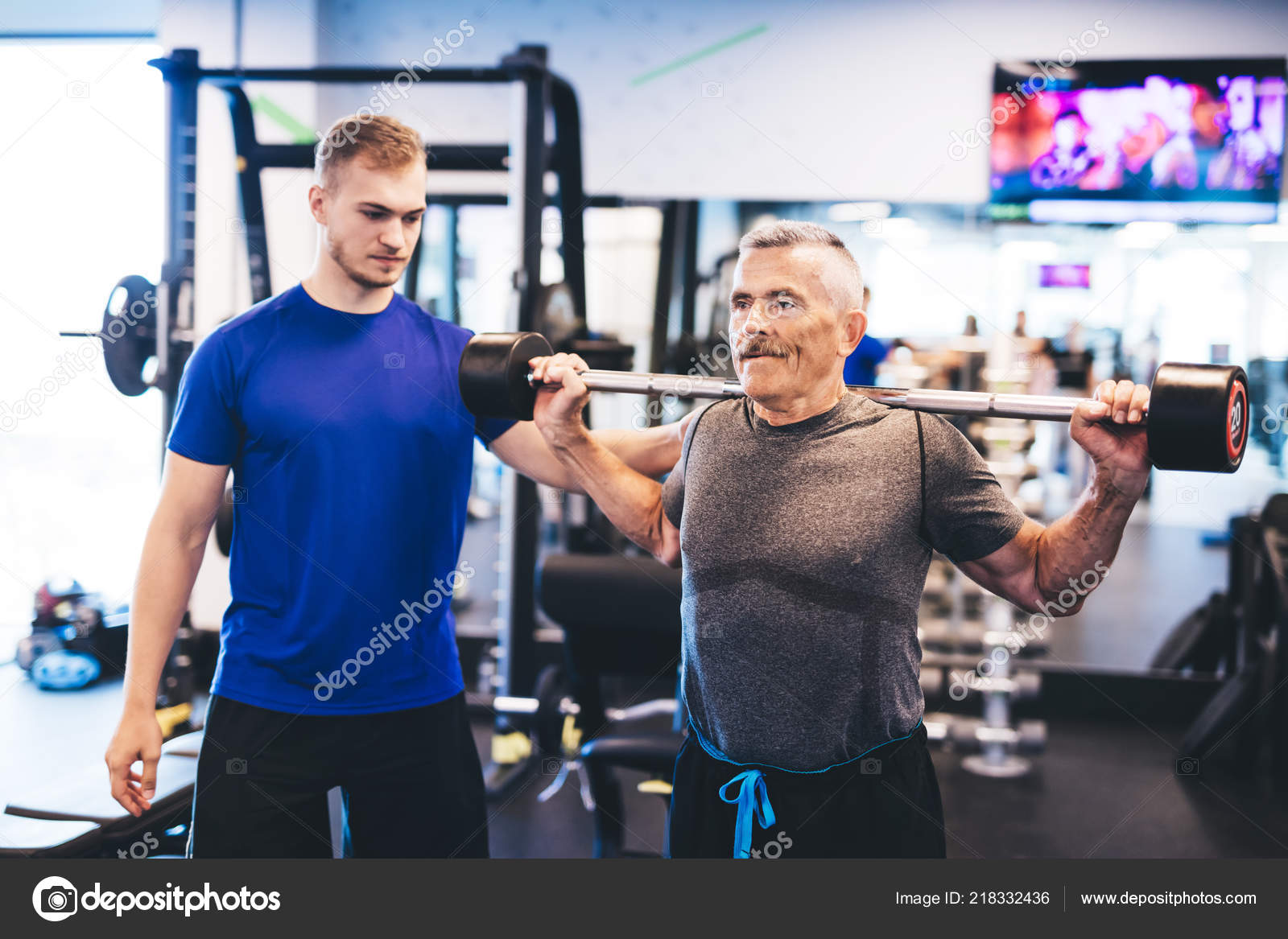 Older Man Personal Trainer Gym Lifting Weights Indoor Workout — Stock Photo © Photocreo #218332436