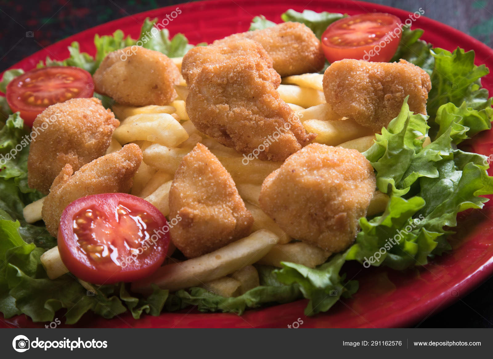 Deep fried chicken nuggets Stock Photo by ©igordutina 291162576