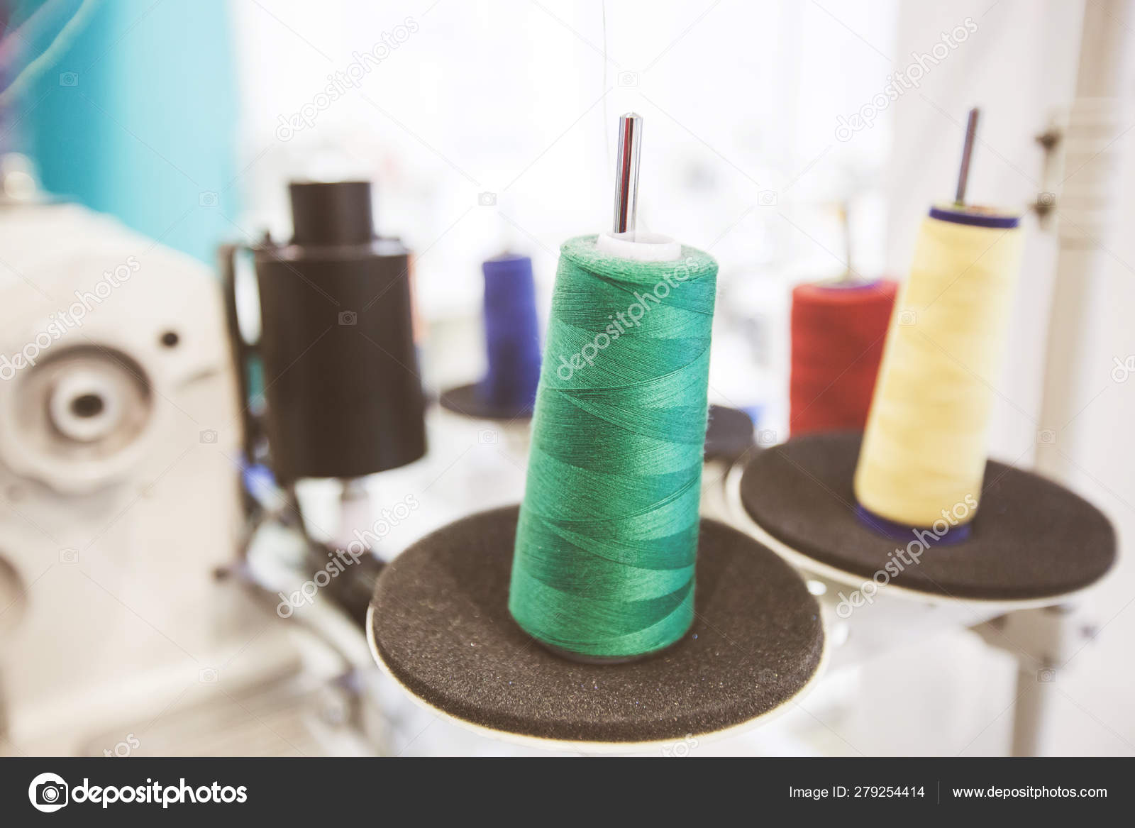 Colorful sewing threads spools at textile workshop — Stock Photo ...