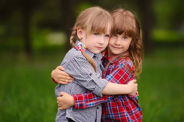Two children hugging Stock Photos, Royalty Free Two children hugging ...