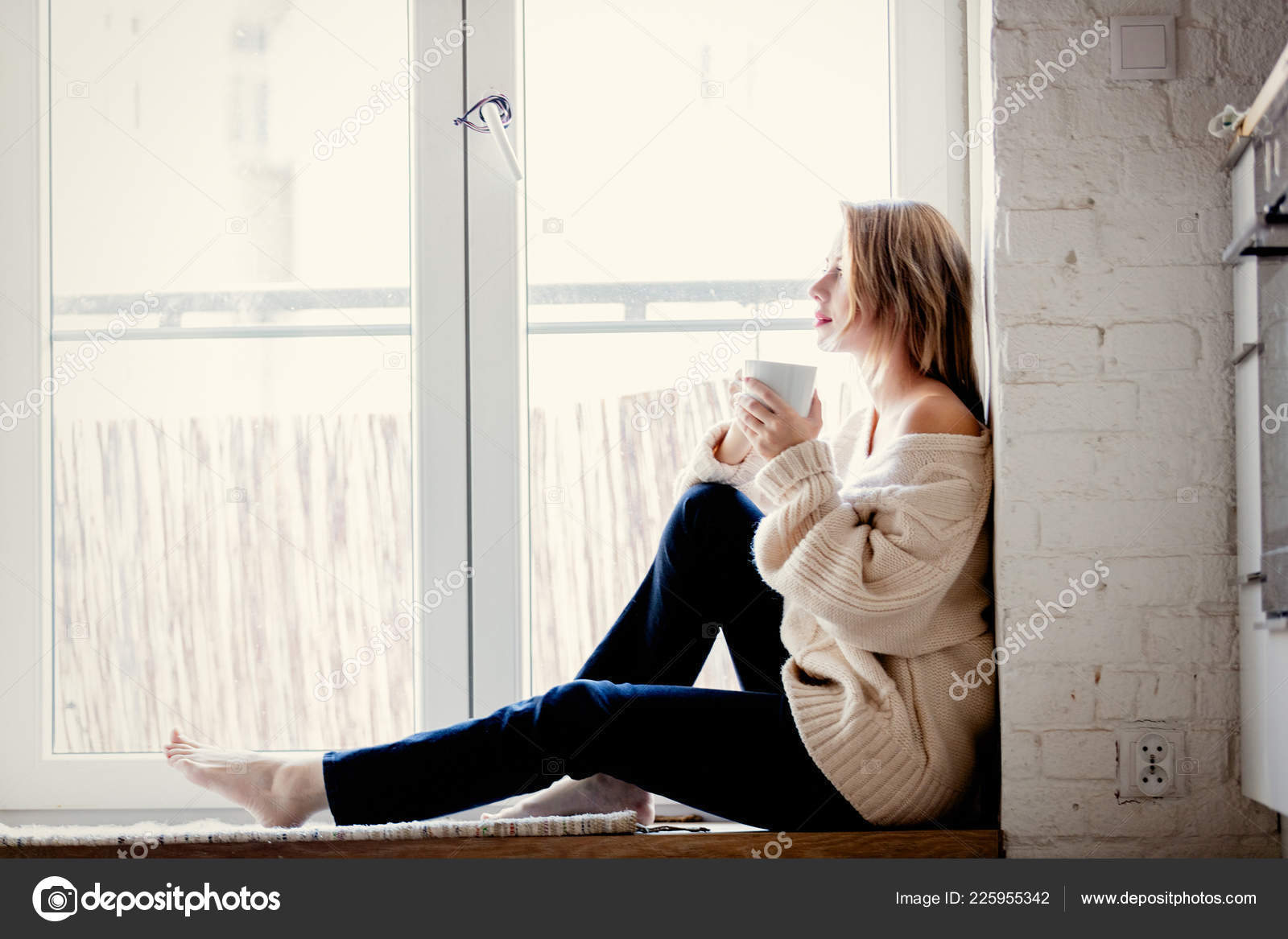 Girl sitting at the threshold with cup of coffee Stock Photo by ...