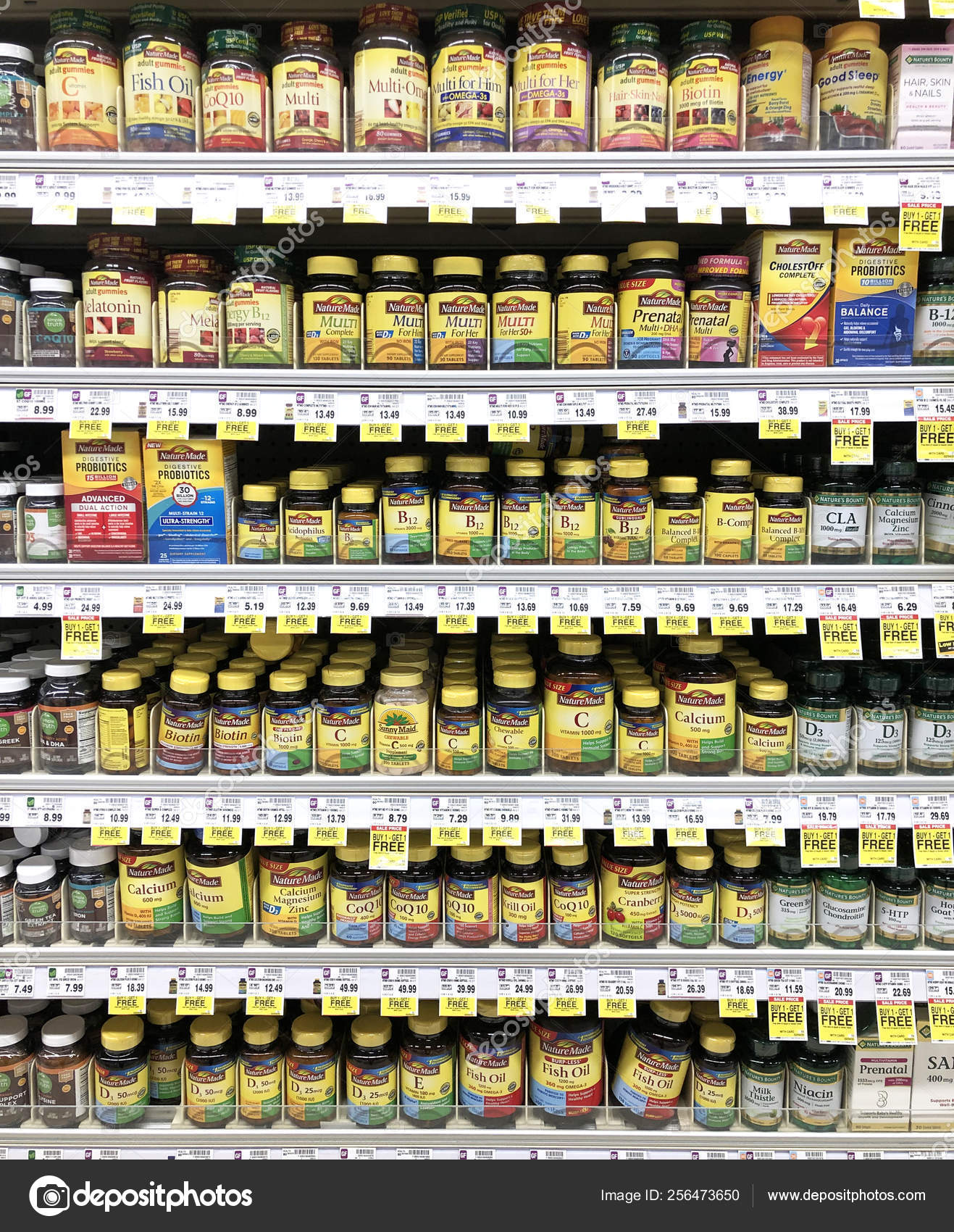 Several brands of Vitamins on a store shelf – Stock Editorial Photo ...