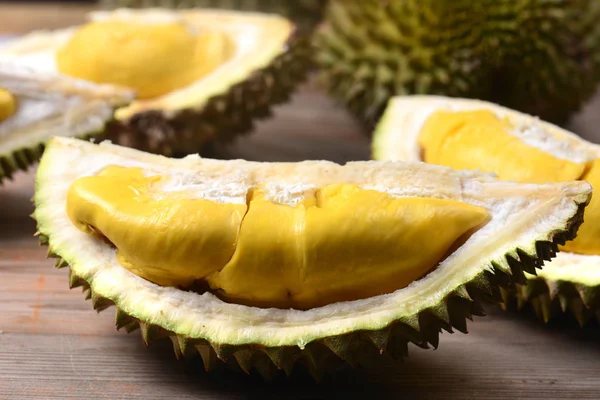Durian Riped Fresh Durian Peel Yellow Color Wooden Table Stock Photo by ©yuliang11 329191106
