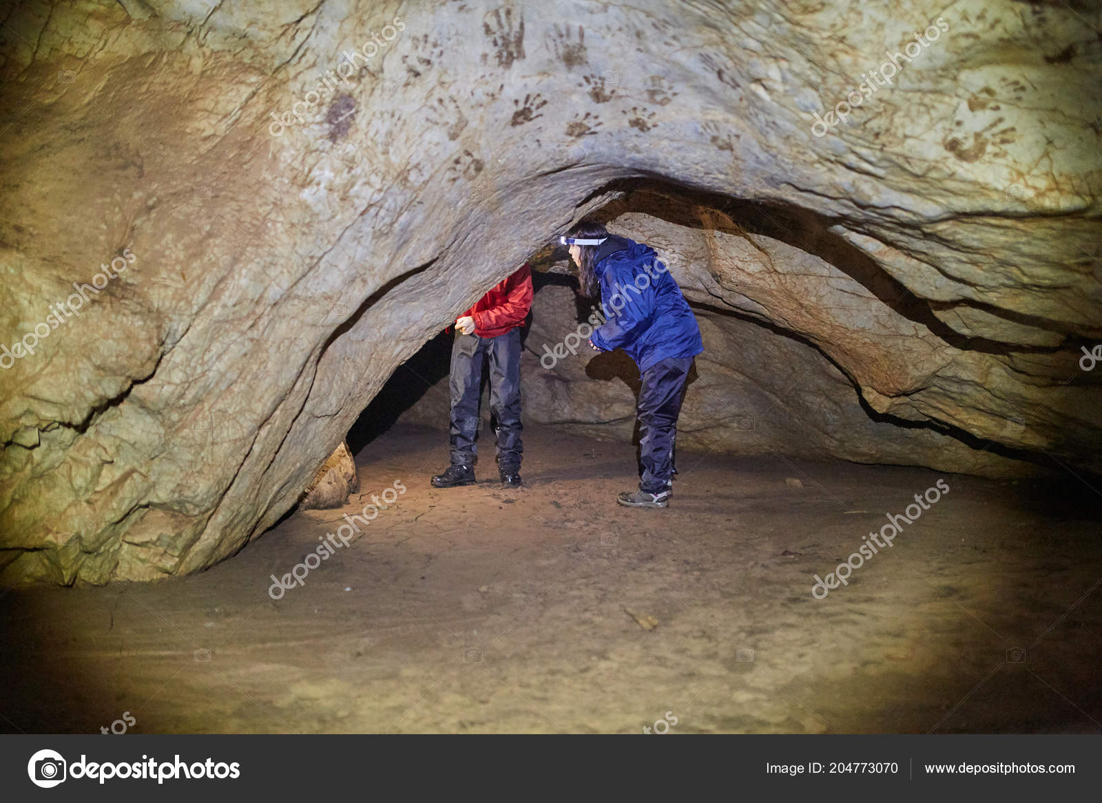 Young Couple Hikers Exploring Cave Limestone Mountain Stock Photo by ...