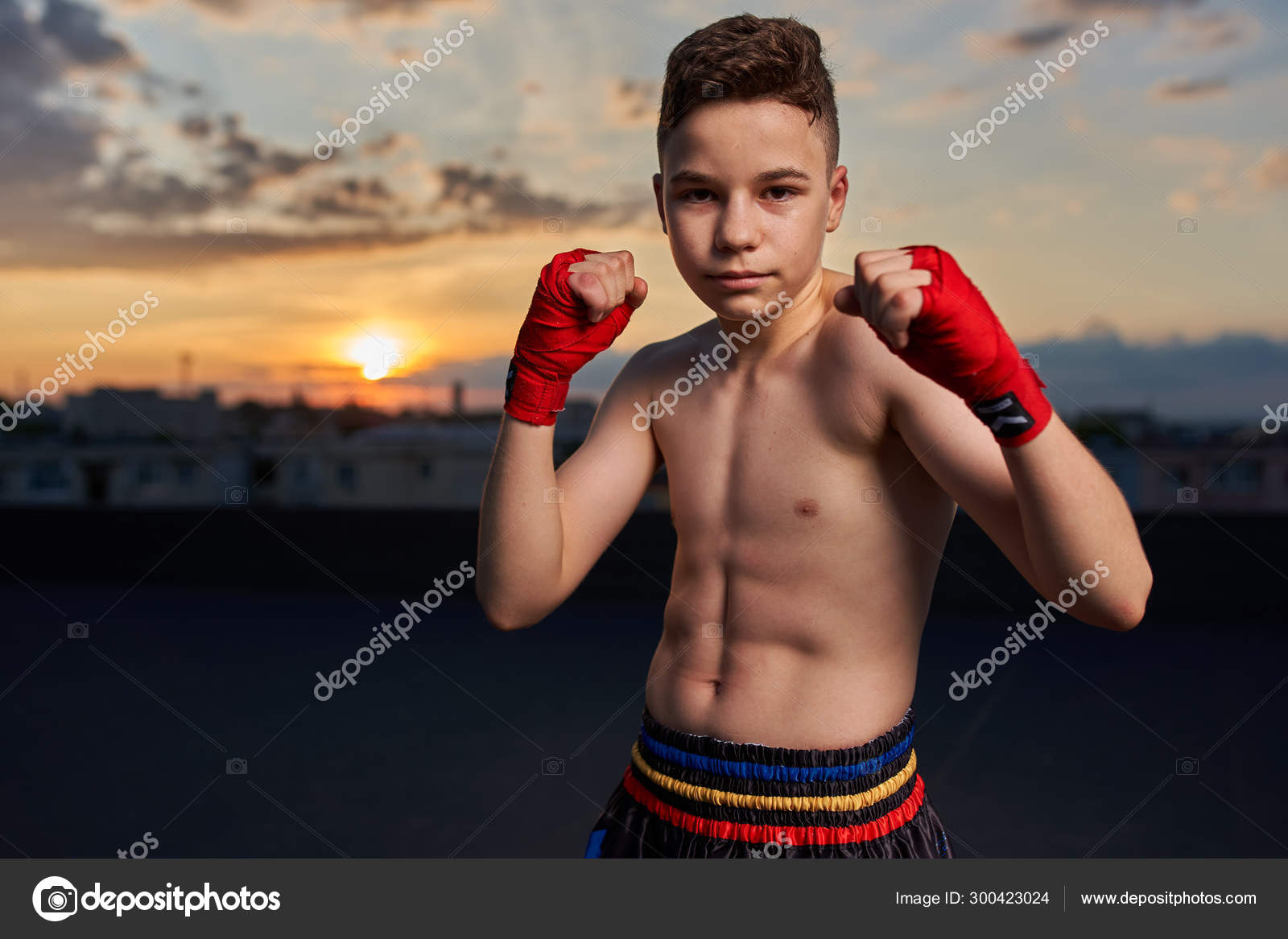 Young Kickboxer Training Roof Sunset — Stock Photo © Xalanx #300423024