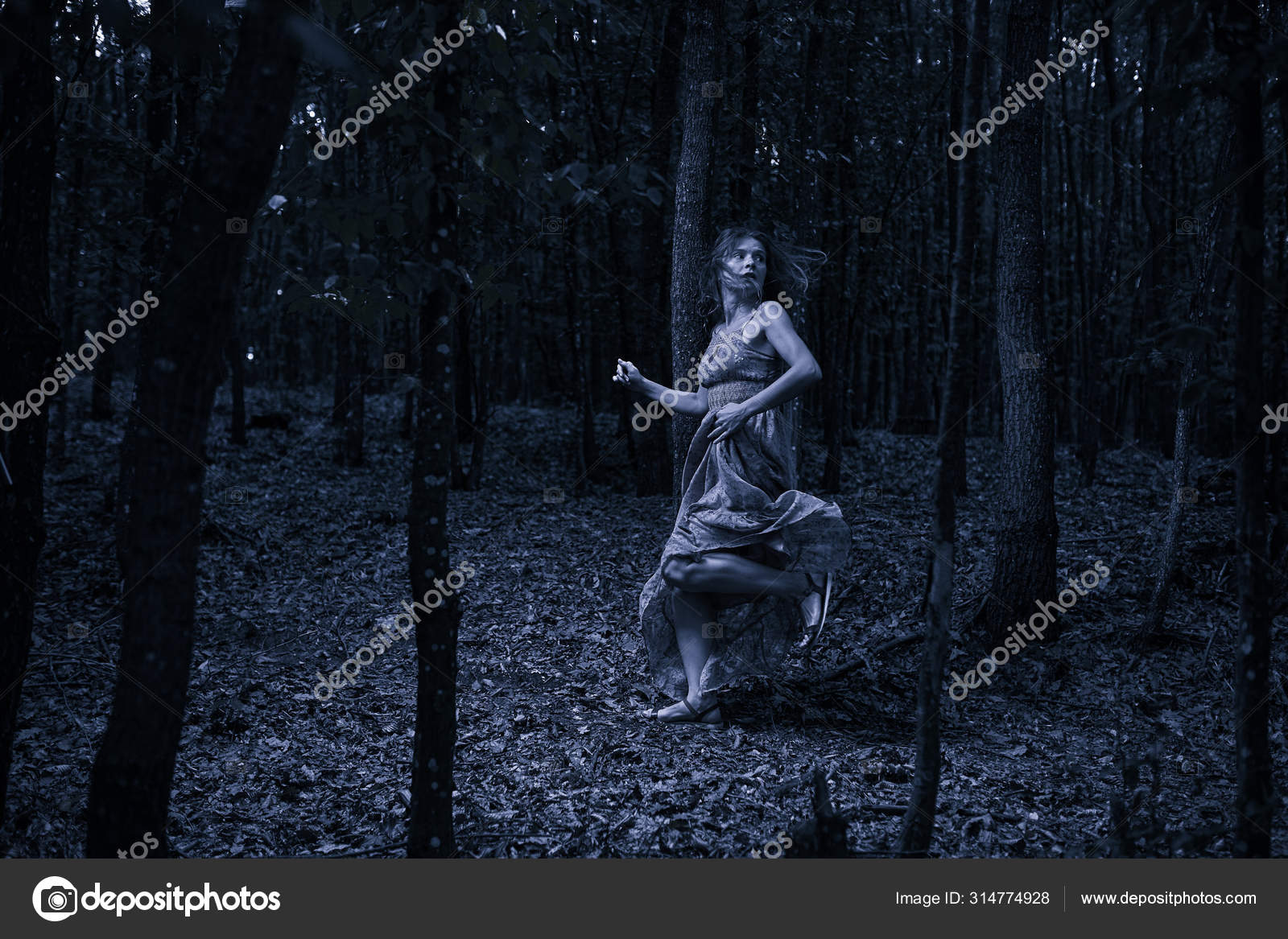 Scared Woman Running Forest Stock Photo by ©Xalanx 314774928