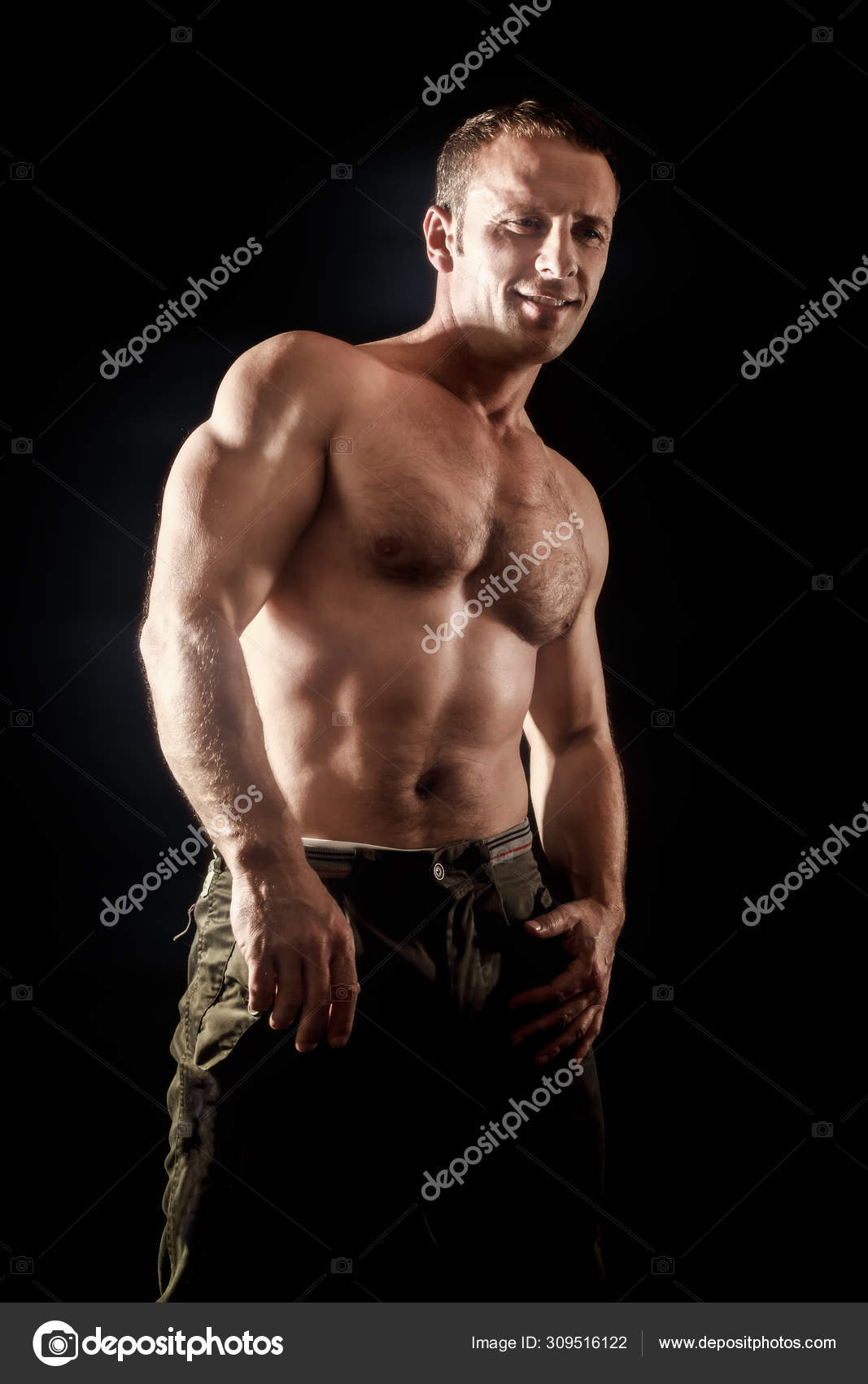 Handsome muscle man side view ⬇ Stock Photo, Image by © magann #309516122