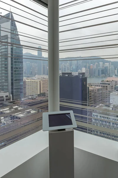 Tablet Display in Corner Window Skyscraper Hong Kong - Stock Image ...