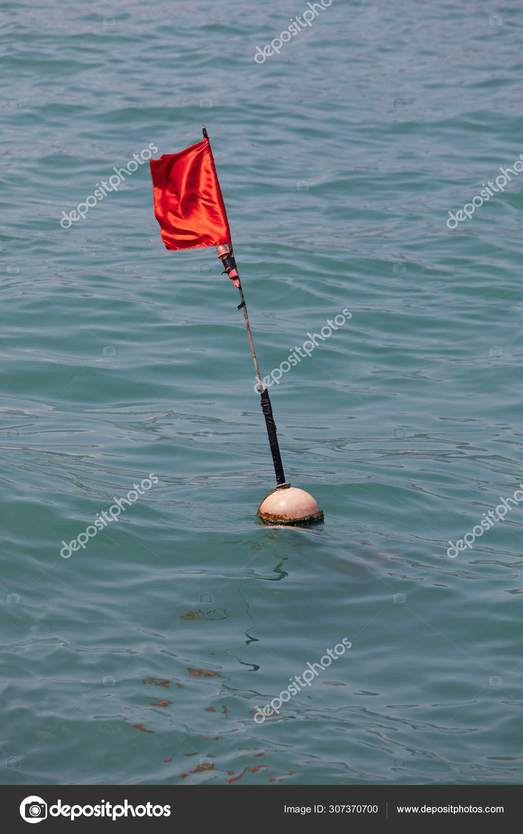 Float Red Flag Stock Photo by ©Baloncici 307370700