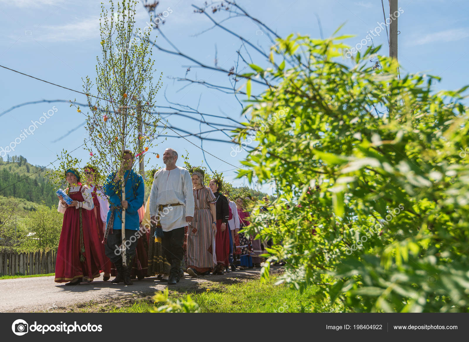 Ancient Russian rite: procession with a birch for its further sinking ...