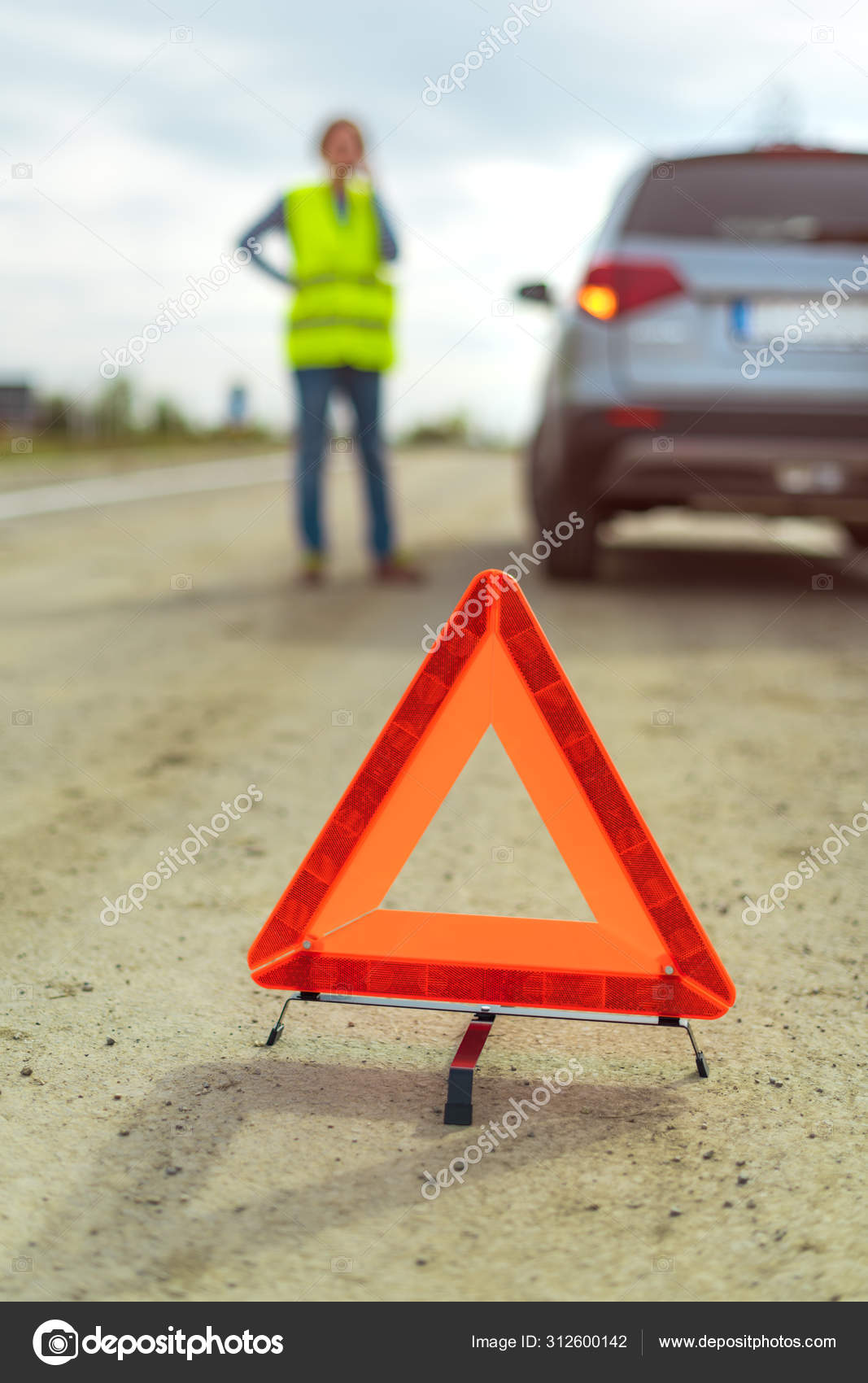 Vehicle breakdown and warning triangle on the road Stock Photo by ...