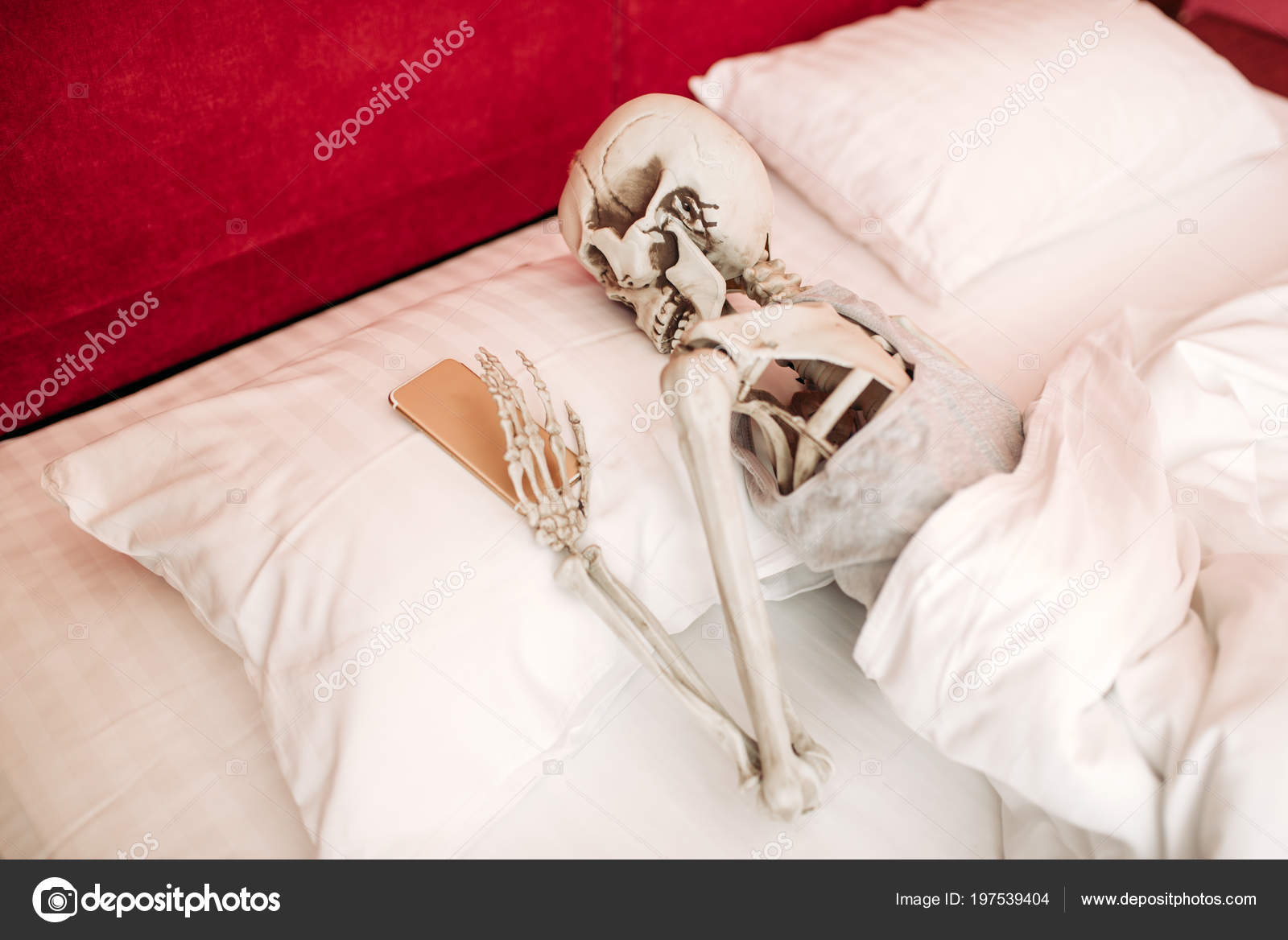 Human Skeleton Mobile Phone Hand Lying Bed Funny Joke Stock Photo by ...