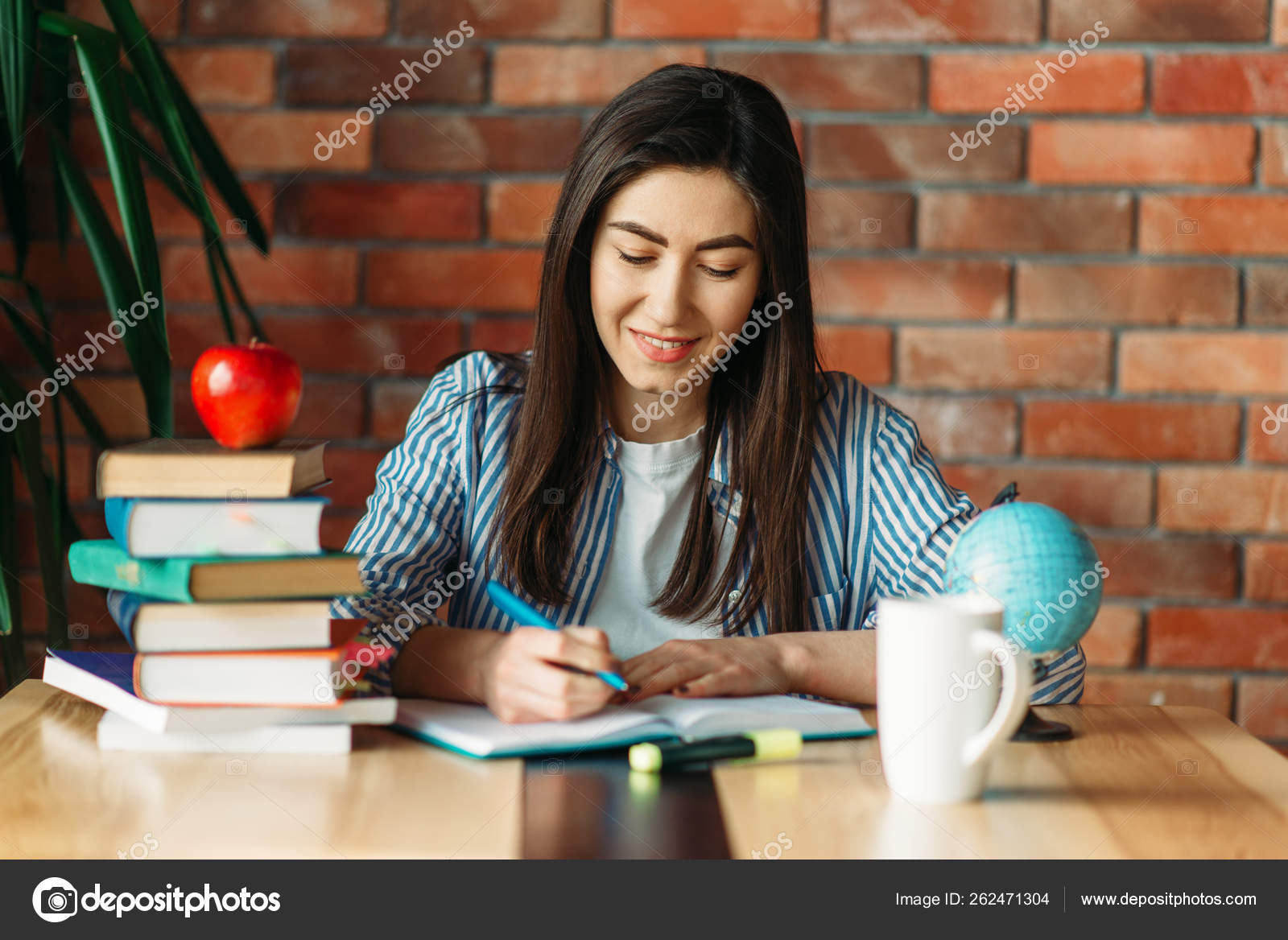 Female University Student Sitting Table Textbooks Apple Top Brick Wall ...