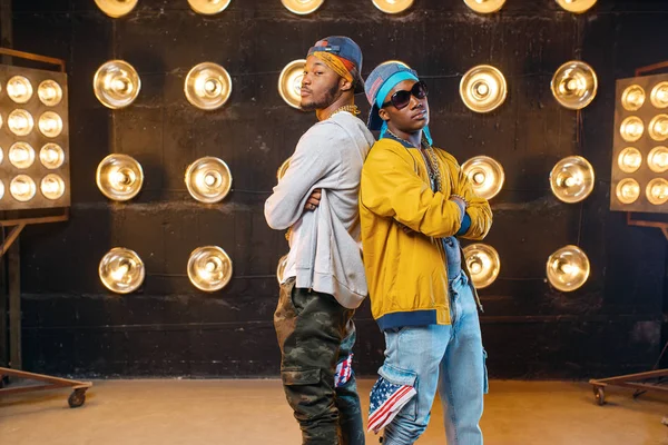 Black Rapper Cap Sitting Steps Singer Stage Spotlights Background Rap ...