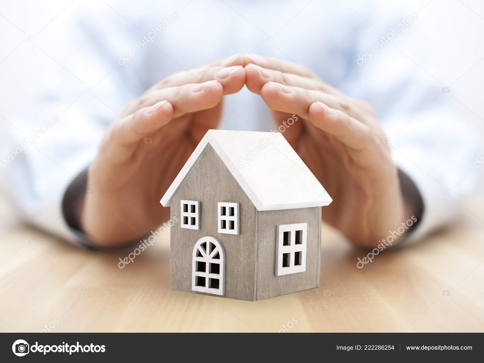 Small Wooden House Covered Hands Stock Photo by ©sqback 222286254