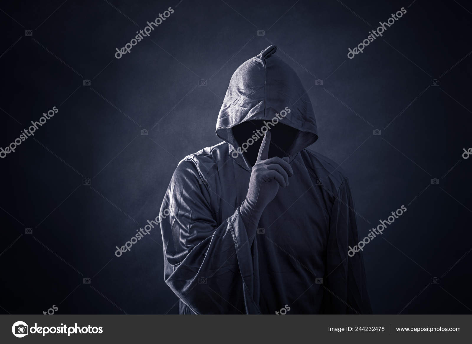Black Cloaked Figure With Hood