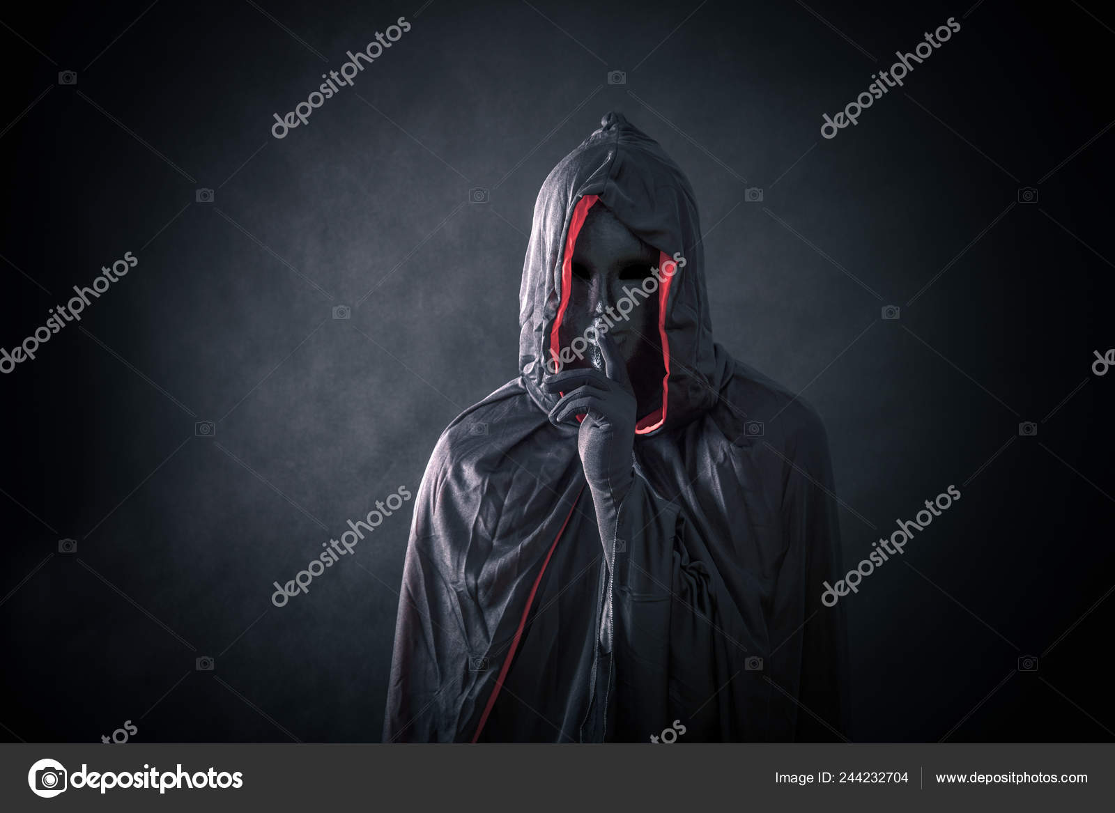 Black Cloaked Figure