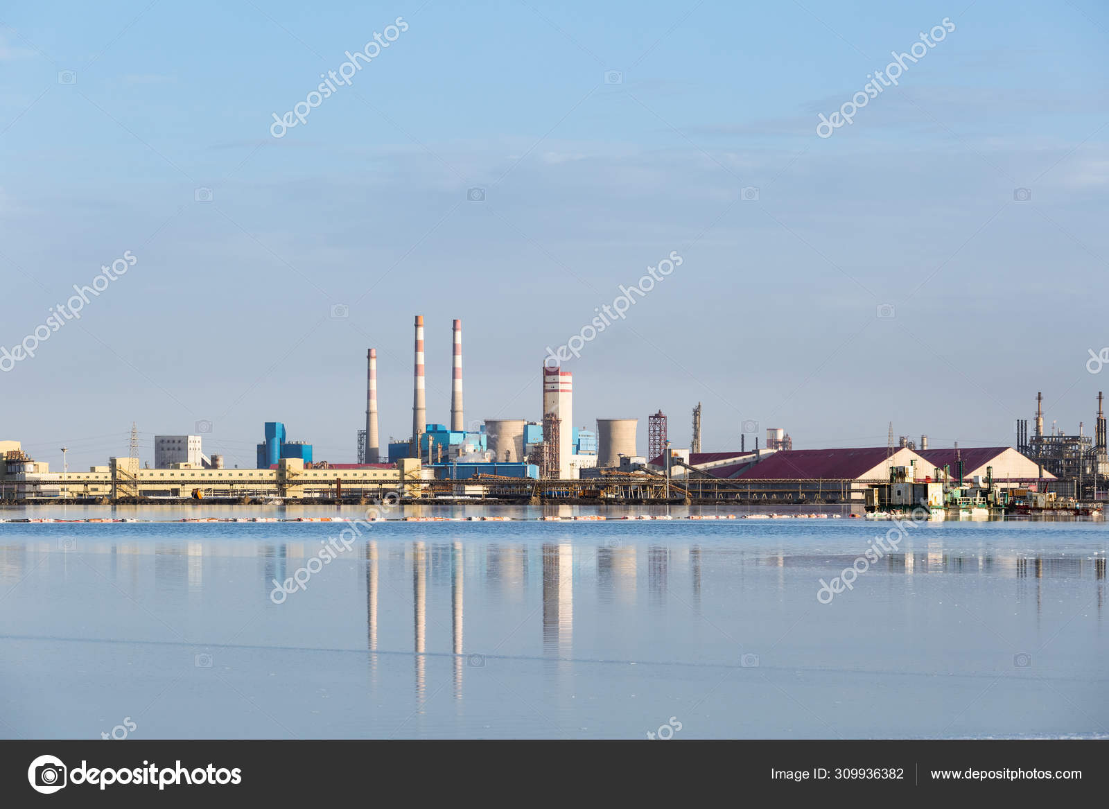 Potash factory reflection in salt lake Stock Photo by ©chungking 309936382