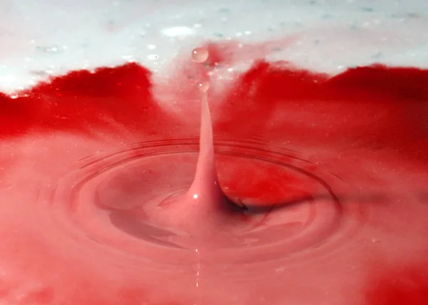 Splash Liquid Drop Water Strikes Its Surface — Stock Photo © BurAndrew ...