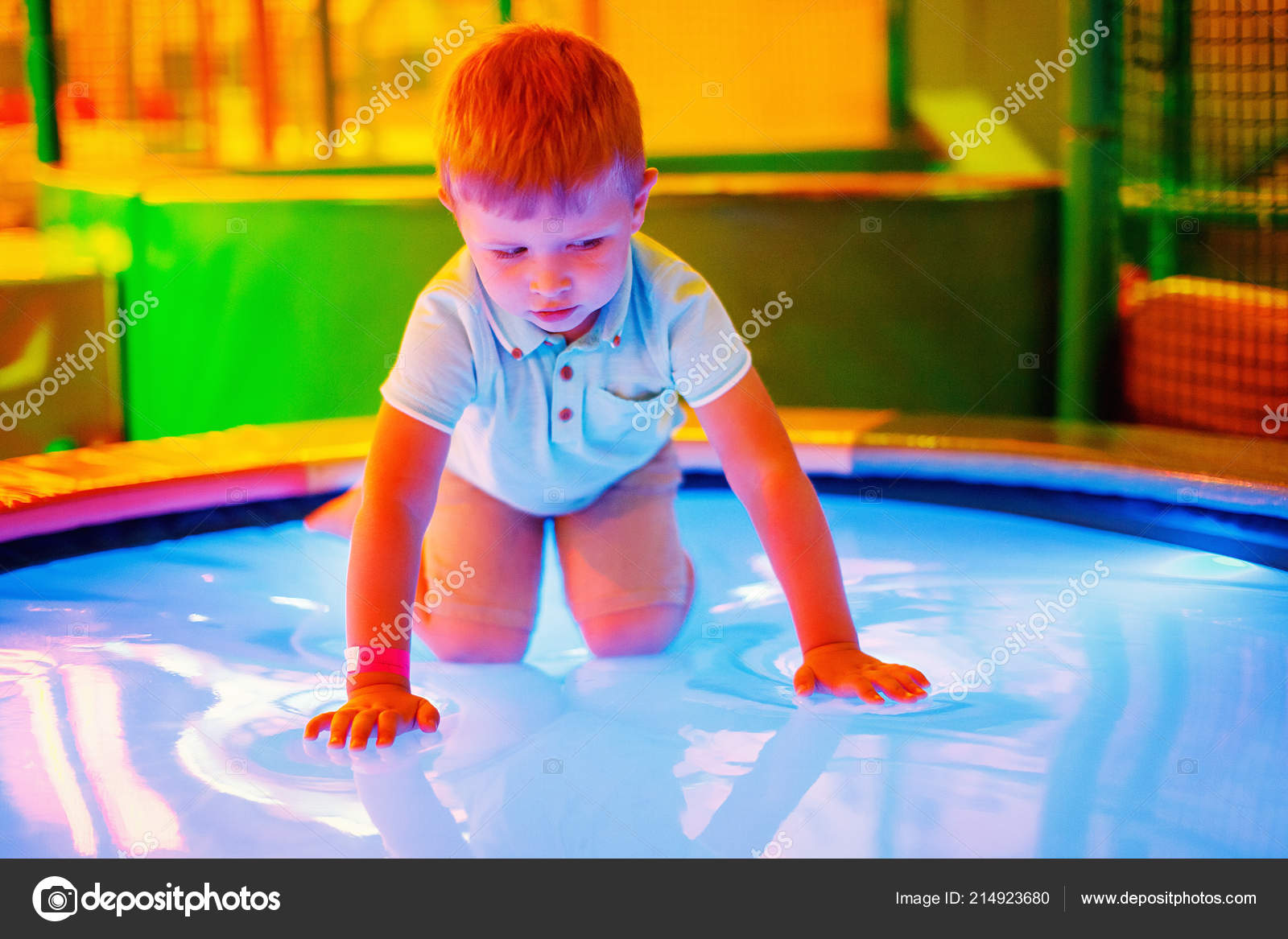 Cute Little Boy Blue Shirt Playing Children's Playground Indoors Stock ...