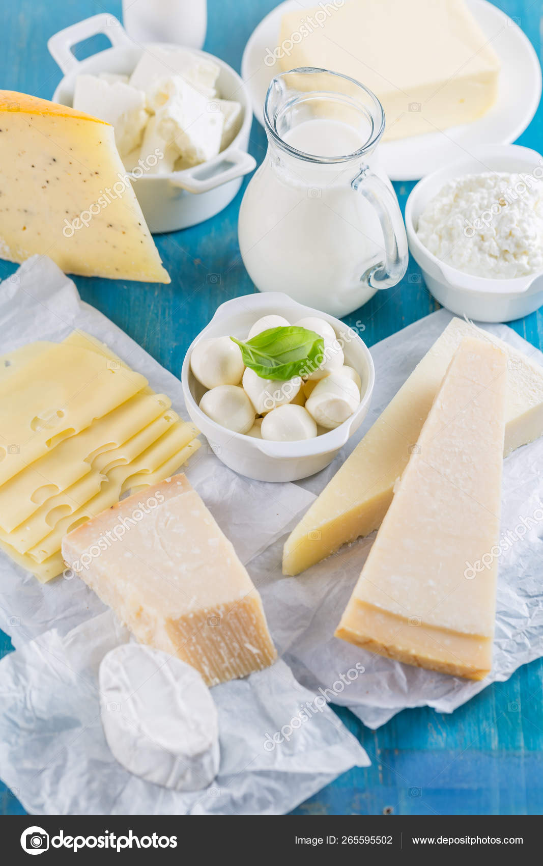 Different types of dairy products on wooden background Stock Photo by ...