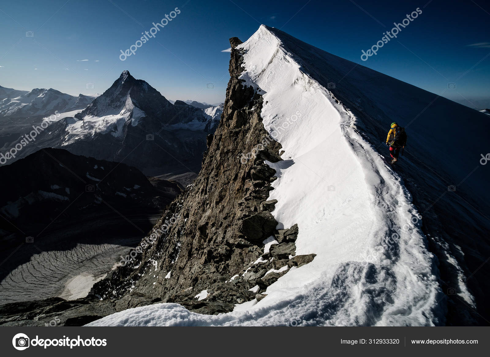 Alpine climbing in the Swiss Alps Stock Photo by ©jakubcejpek 312933320